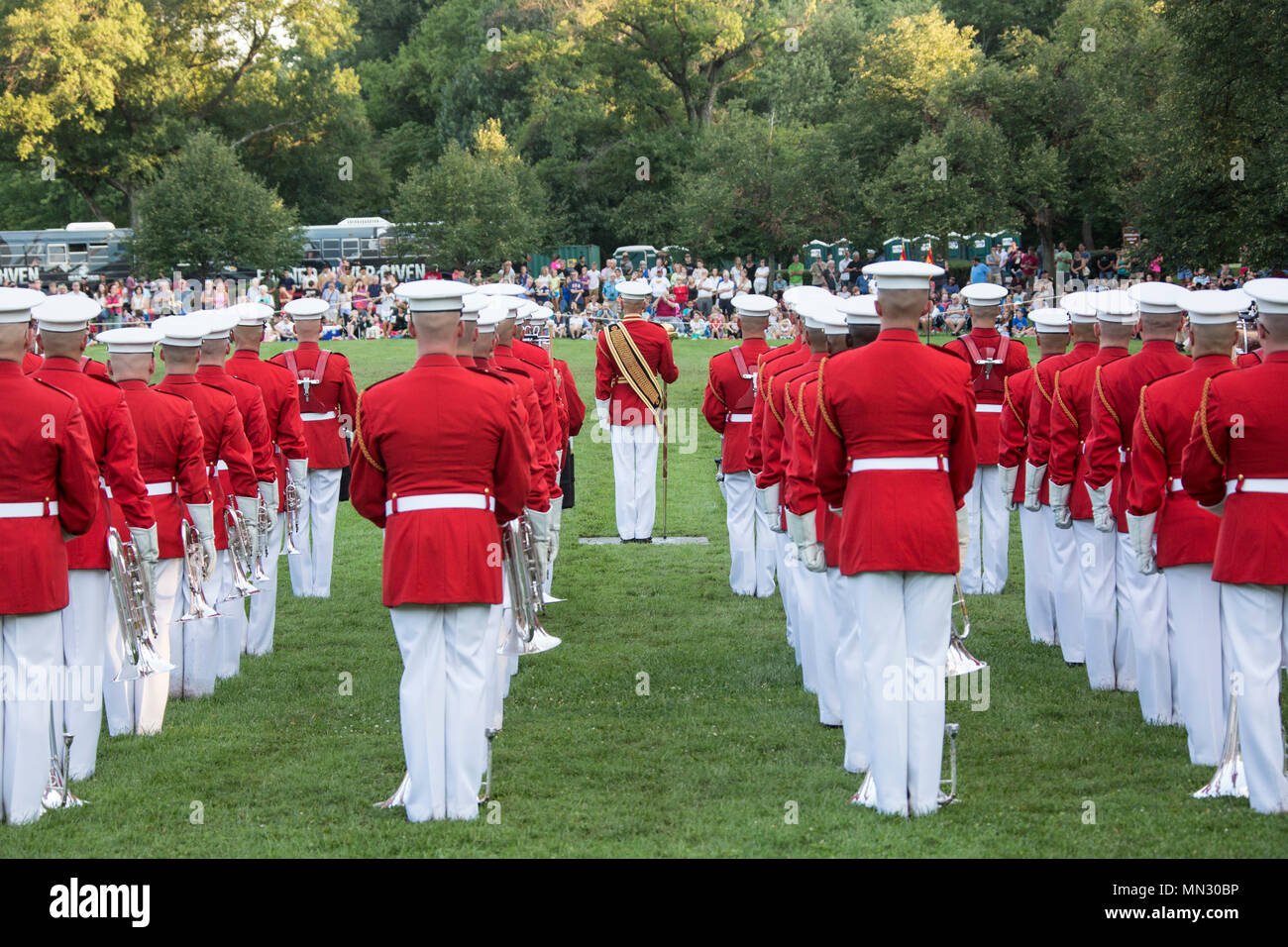 The U.S. Marine Drum and Bugle Corps performs during a sunset parade at ...