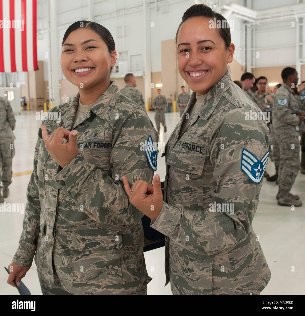 Senior Airmen Kaelah Ignacio (left) and Emeliana Punahele (right), from ...