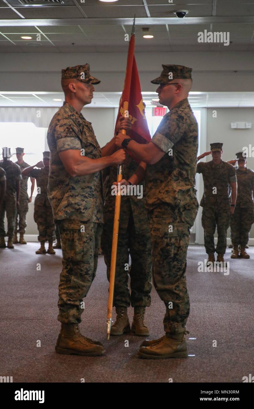 U.S. Marine Corps Capt. Burton C. Mitchell, left, incoming Company ...