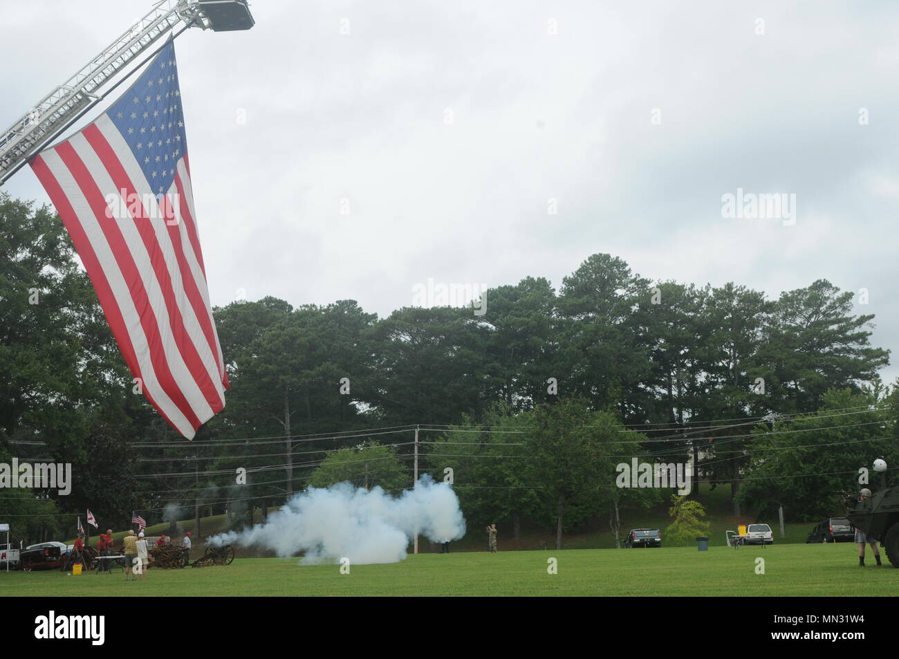 Members of the Alabama Artillery Group cannon firing team fire their ...