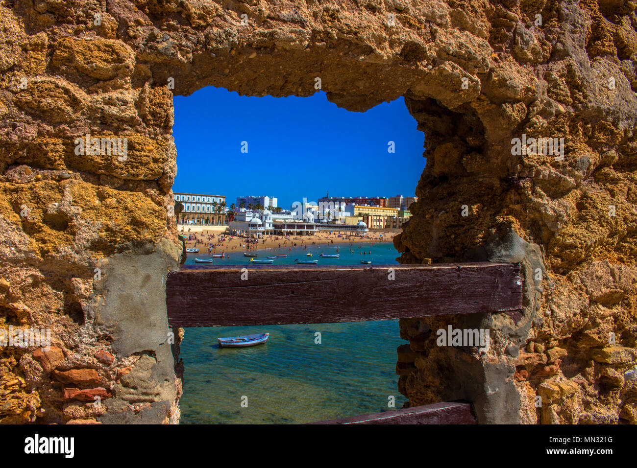 Beach. View of the beach of Cadiz through the window of the ...