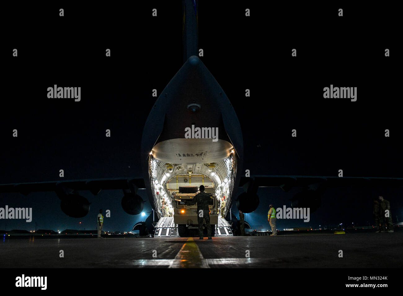 U.S. Air Force Staff Sgt. Justin Baez, a loadmaster with the 816th ...