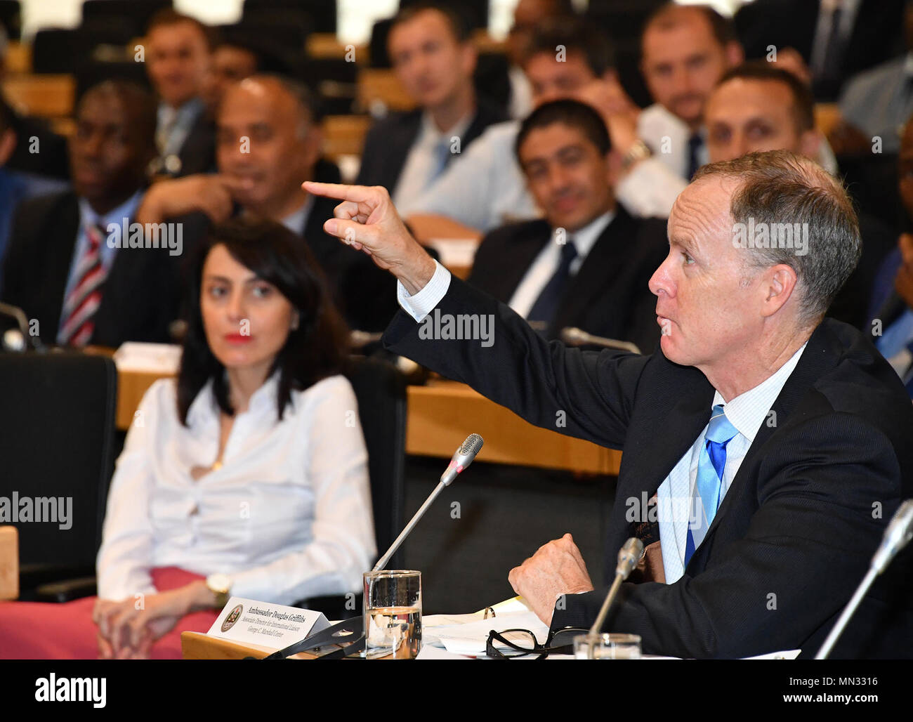 Associate Director for International Liaison U.S. Ambassador Douglas ...