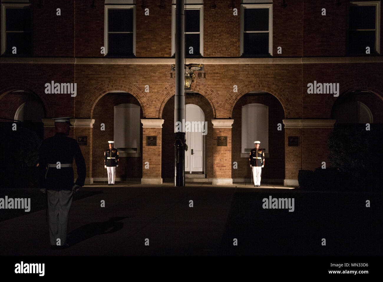 U.S. Marines with Marine Barracks Washington (MBW) stand at the ...