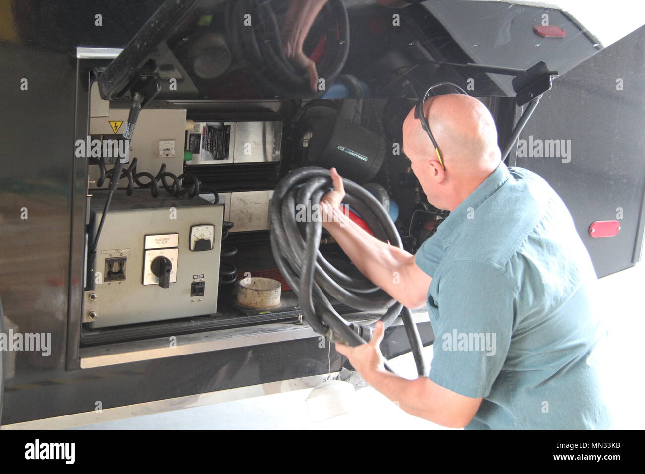 Matt Hopper, a Telecommunications Specialist for Task Force 51, Army ...