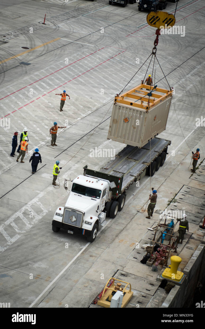 Sailors, assigned to Navy Cargo Handling Battalion ONE (NCHB-1) and ...
