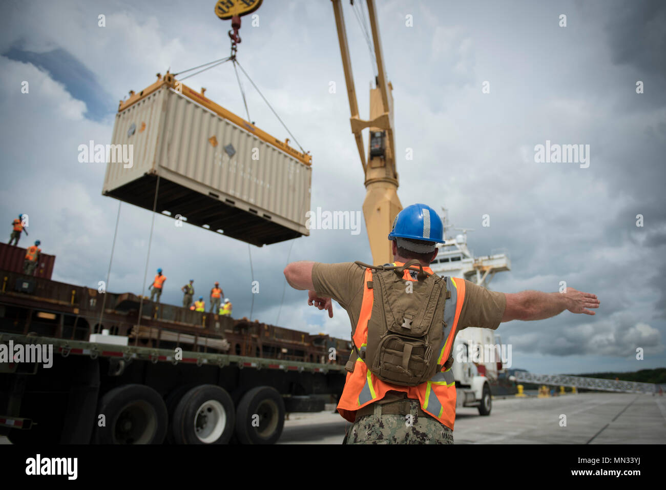 Sailors, assigned to Navy Cargo Handling Battalion ONE (NCHB-1) and ...