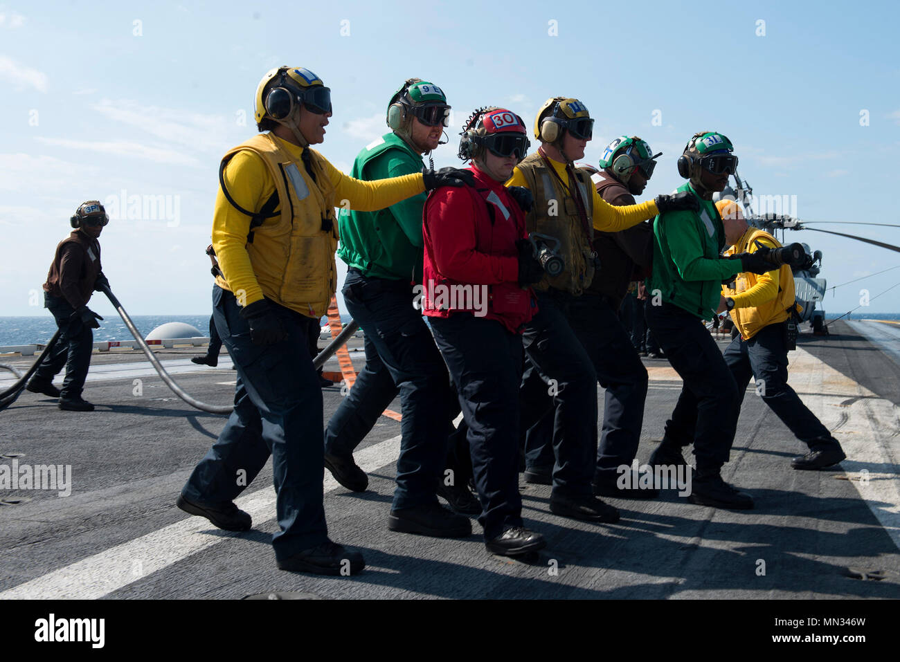 Fire hose handling techniques hi-res stock photography and images - Alamy