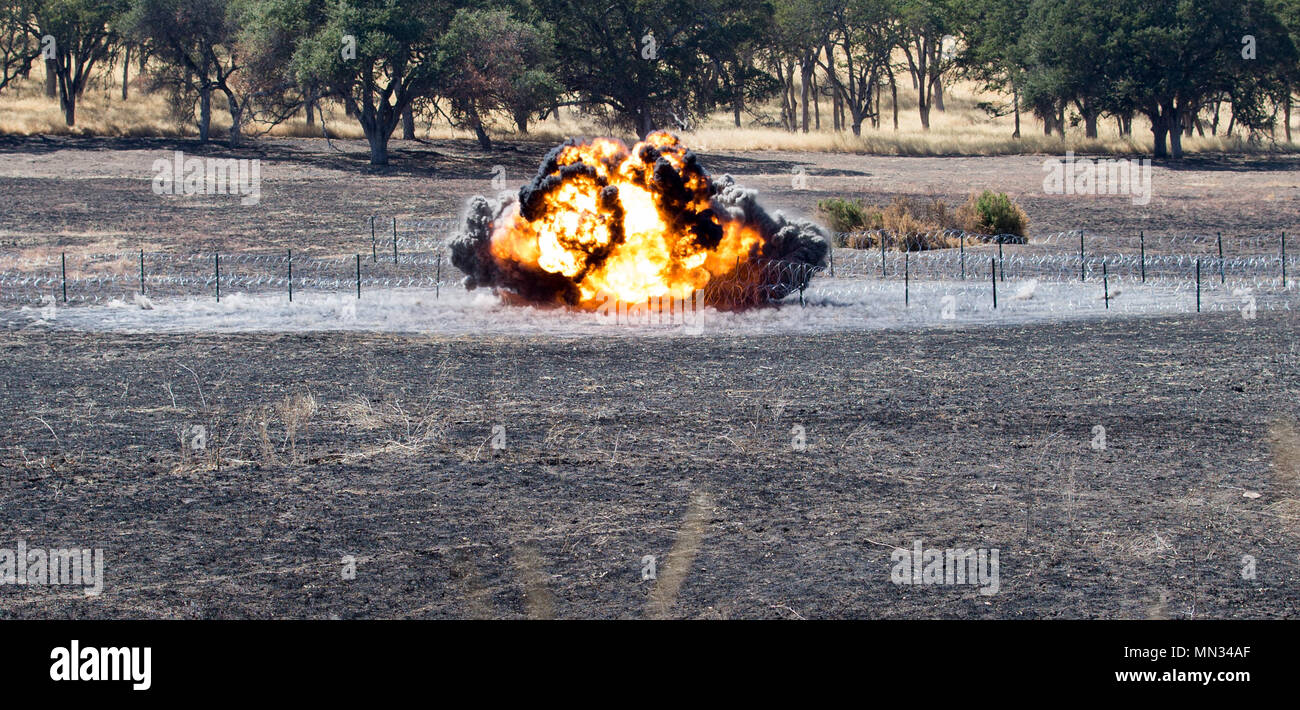 An explosion, set by U.S. Marines with 1st Combat Engineer Battalion ...