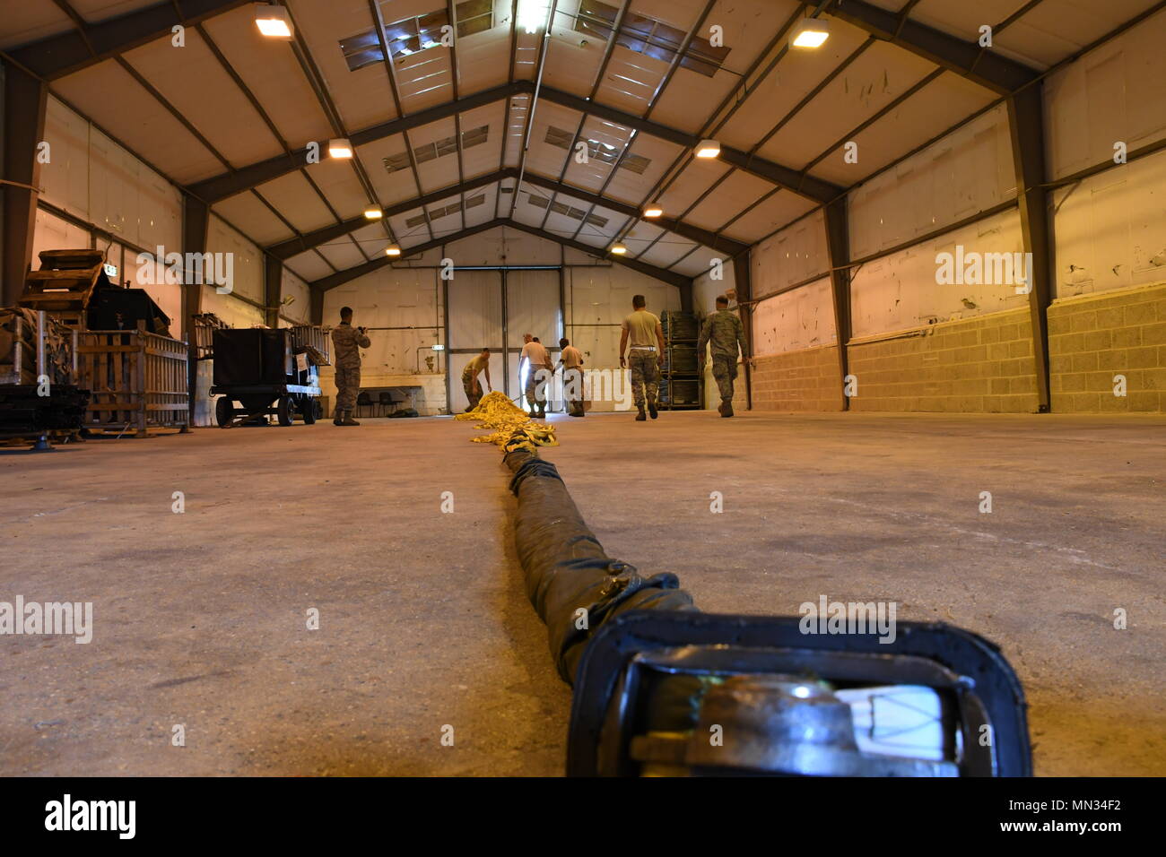 Airmen from the 307th Operations Support Squadron unroll a B-52 ...