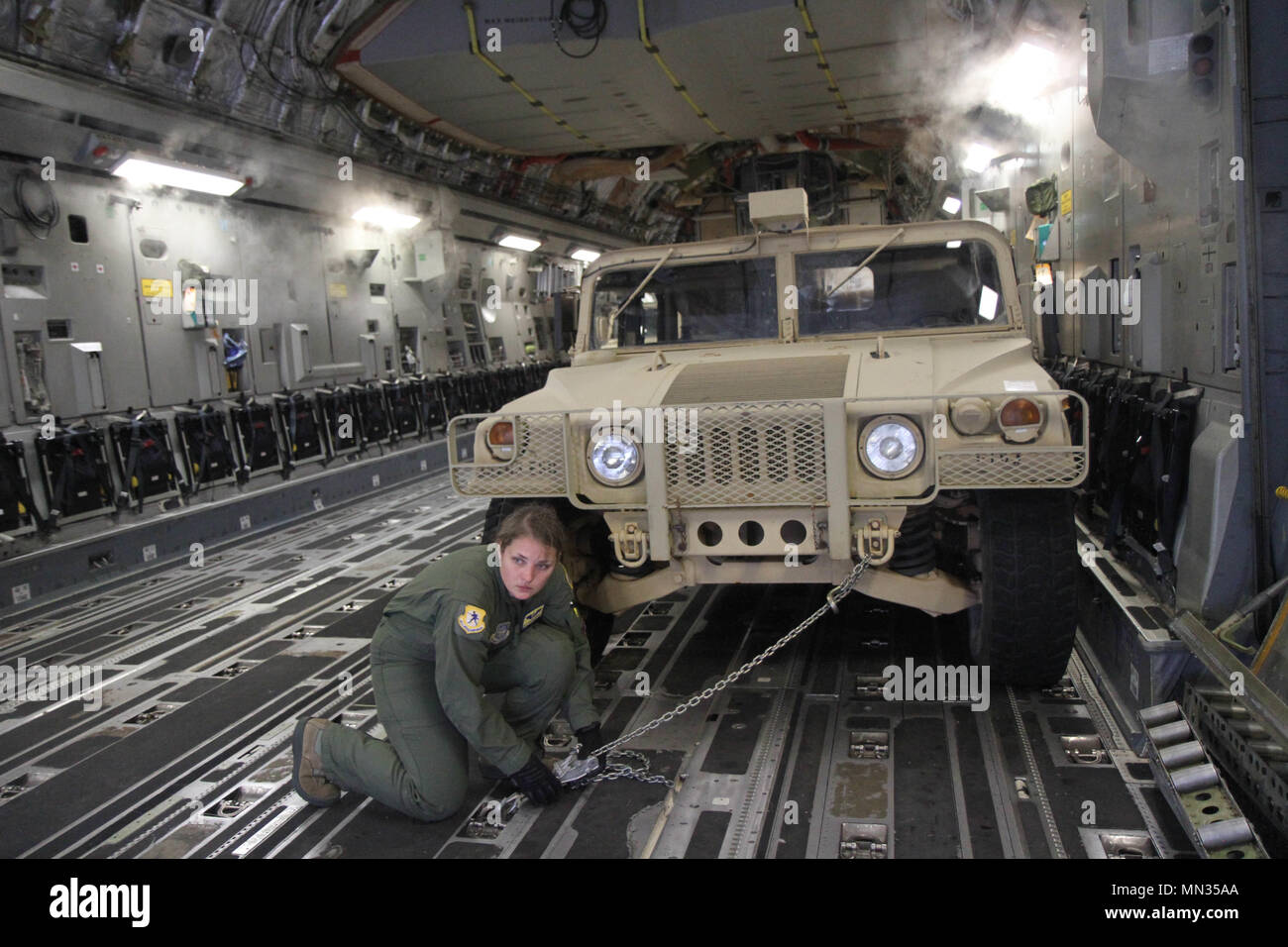 HUNTER ARMY AIRFIELD, GA -- An Airman secures equipment and vehicles ...
