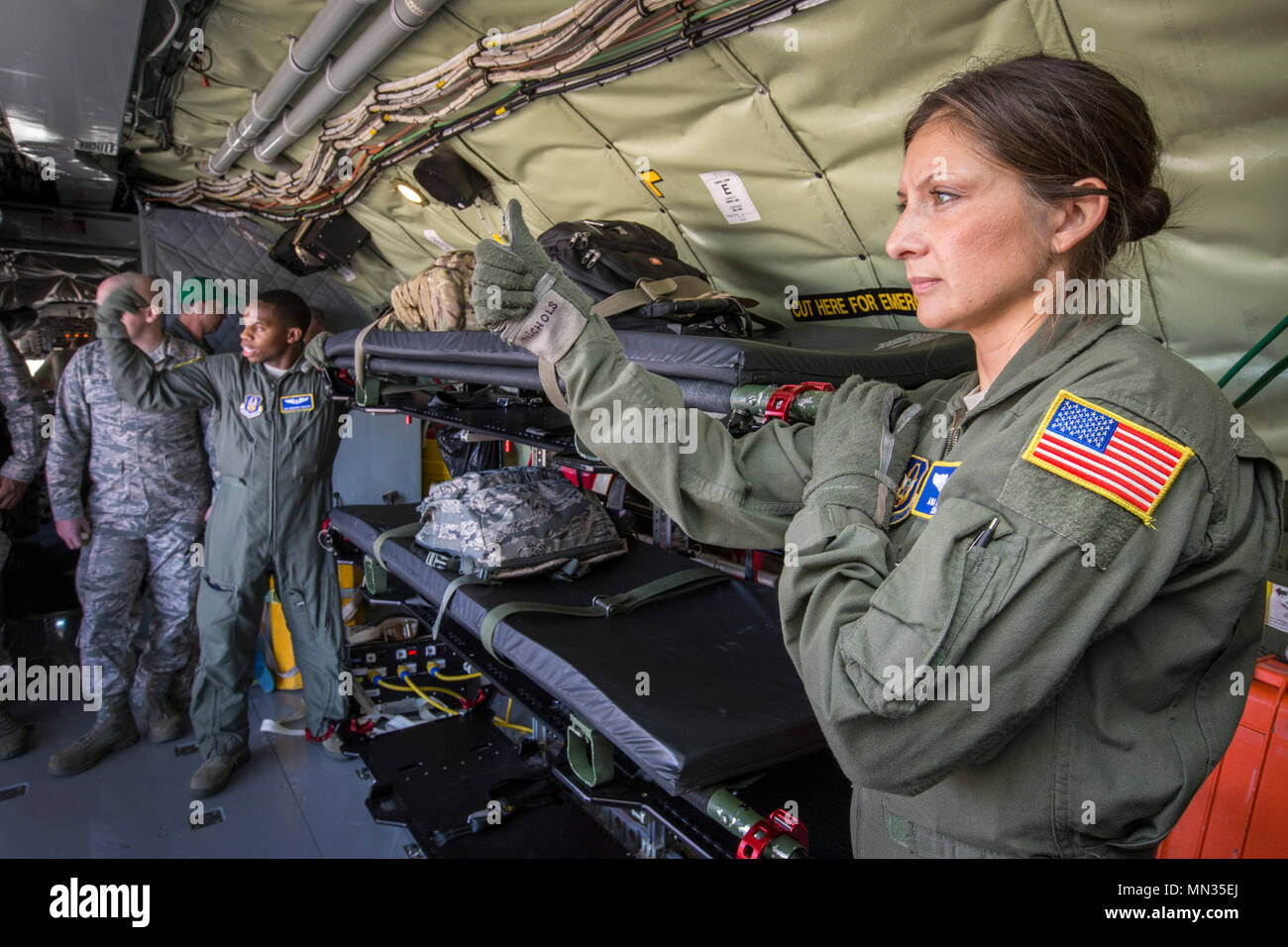 U.S. Air Force Staff Sgt. Ana Nichols, right, and Senior Airman Marquis ...