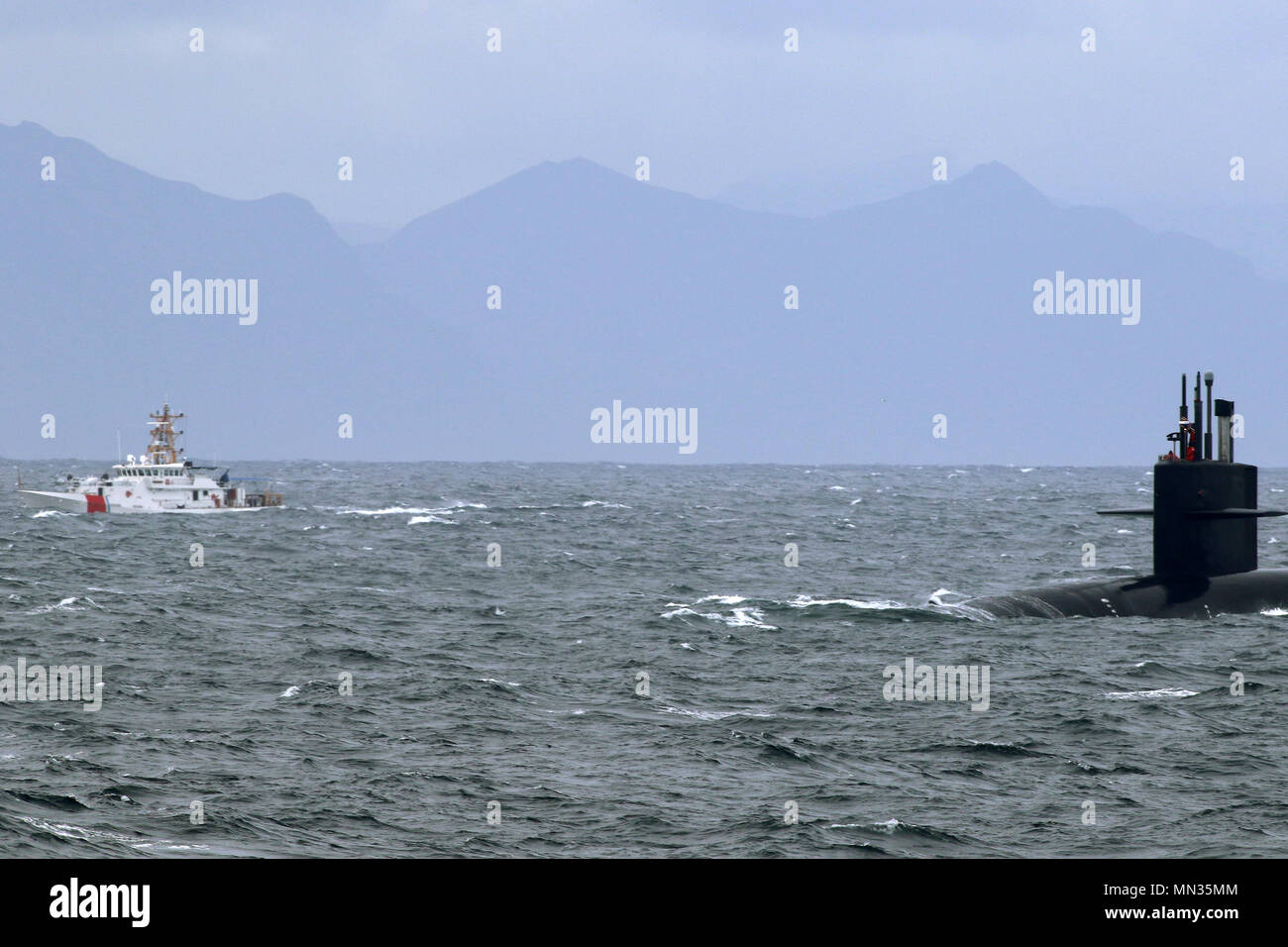 The crew of the Coast Guard Cutter Bailey Barco (WPC 1122), a fast ...