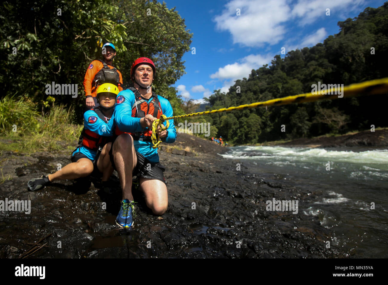 TULLY GORGE, Australia – Lieutenant Tom Berry, right, a signals troop ...