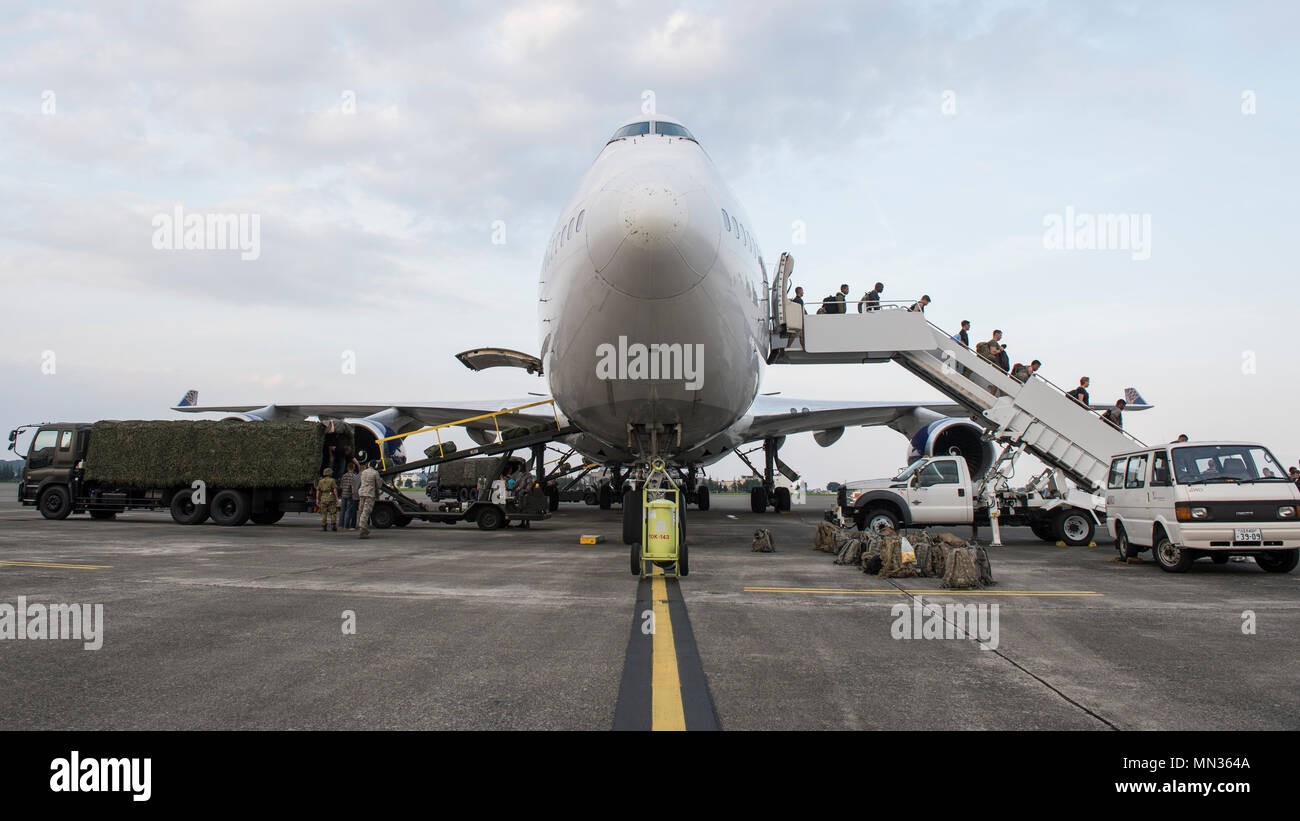 Soldiers assigned to U.S. Army Pacific Command (USARPAC) disembark a ...