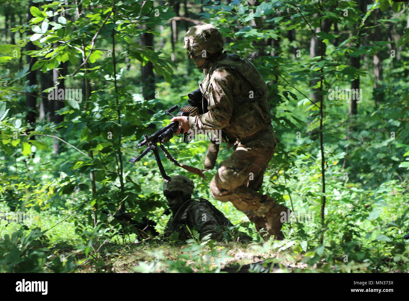 Spc. Dylan Schuman and Cpl. Jonathan Hannah from Charlie Company ...