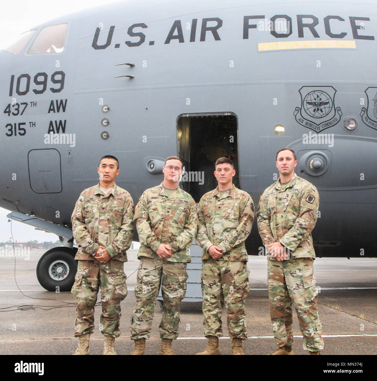 HUNTER ARMY AIRFIELD, GA -- Staff Sgt. Logan, Brightwell (right), an ...