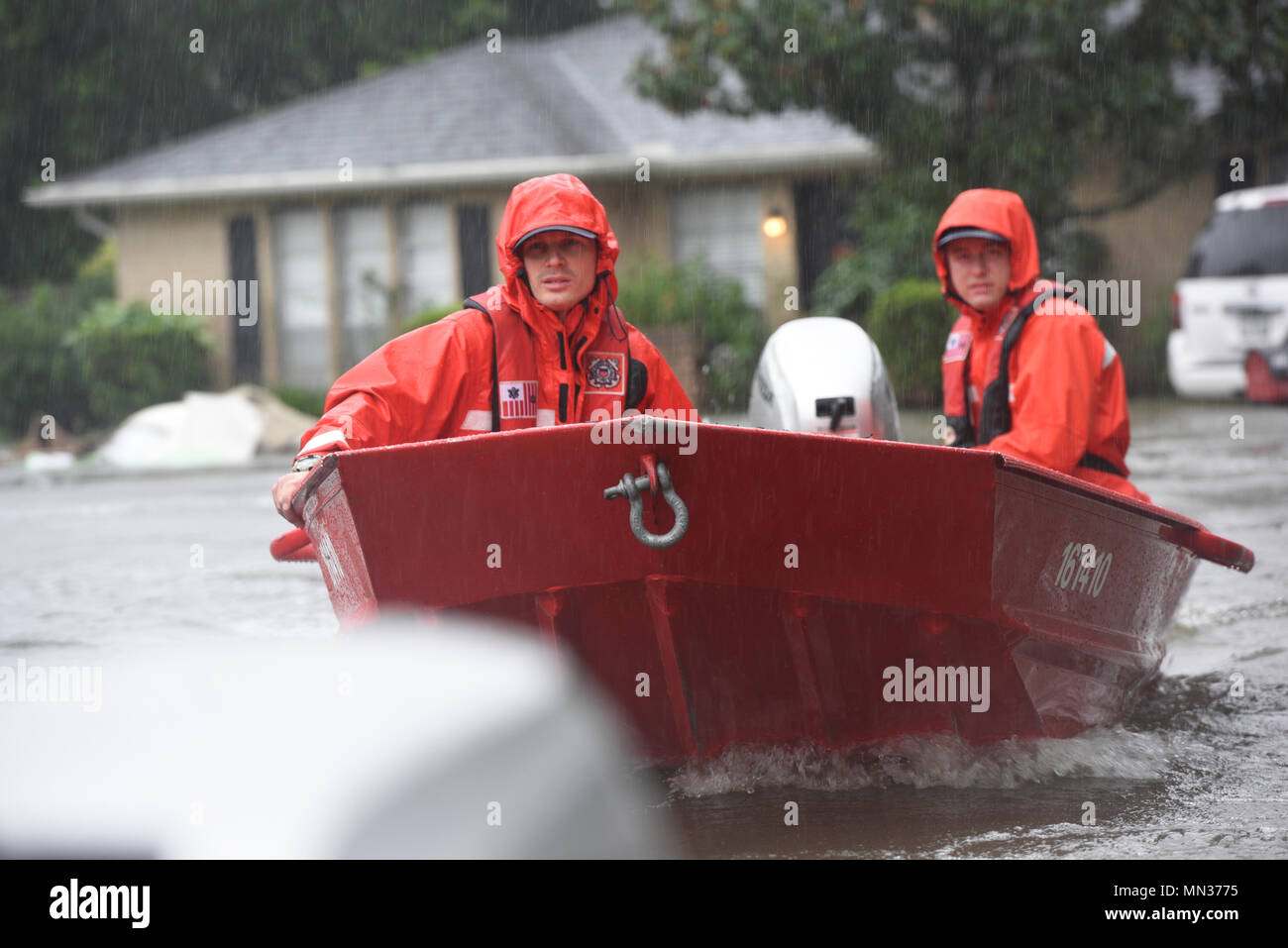 Coast Guard Petty Officers 3rd Class Eric Gordon and Gavin Kershaw ...