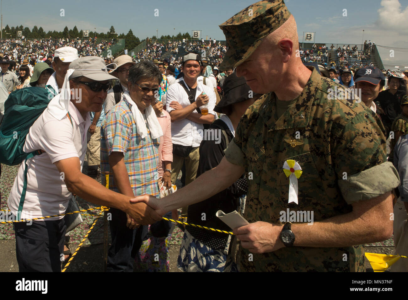 CATC CAMP FUJI, Japan— Brig. Gen. Paul J. Rock Jr., shakes hands with ...