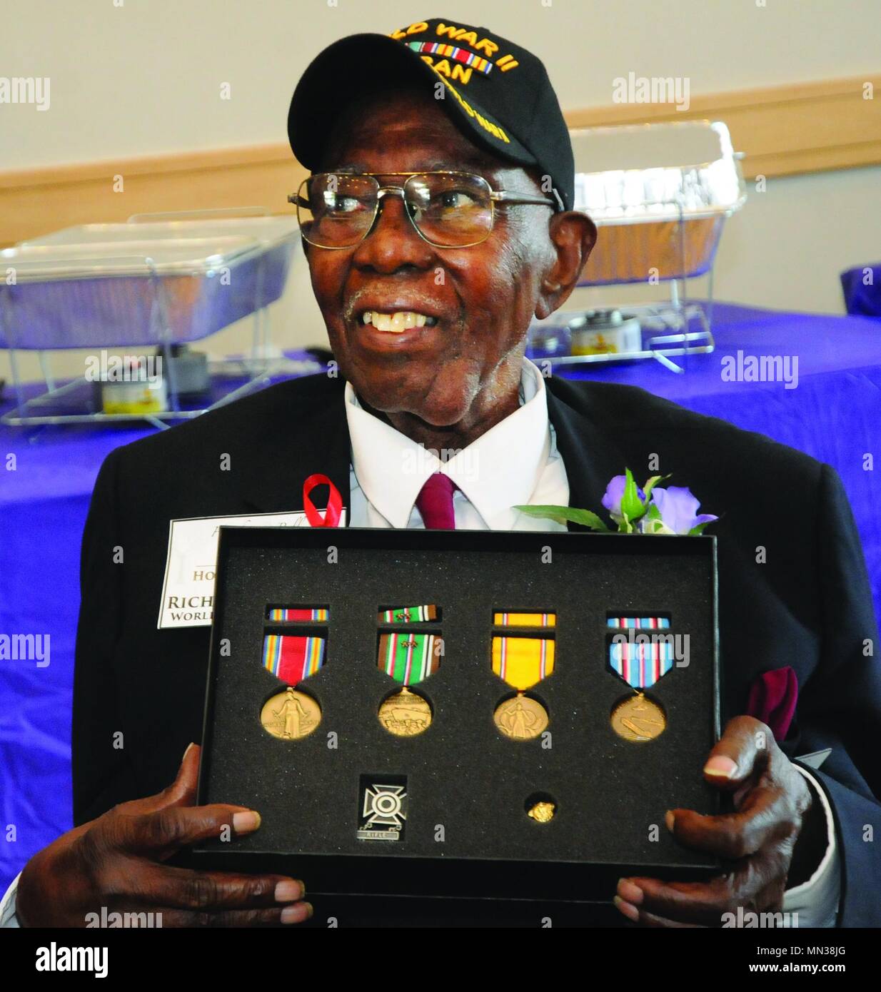 Richard Bell, a 99-year-old veteran and Blackstone resident, poses for ...