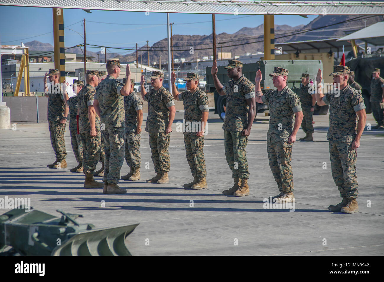 U.S. Marines with 3rd Battalion, 11th Marines, recites the oath of ...