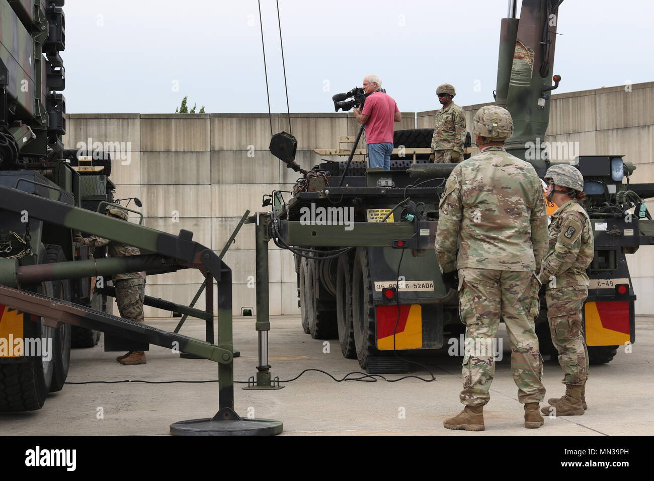 Kyle Eppler, NBC New's cameraman, films Soldiers from 6-52 Air Defense ...