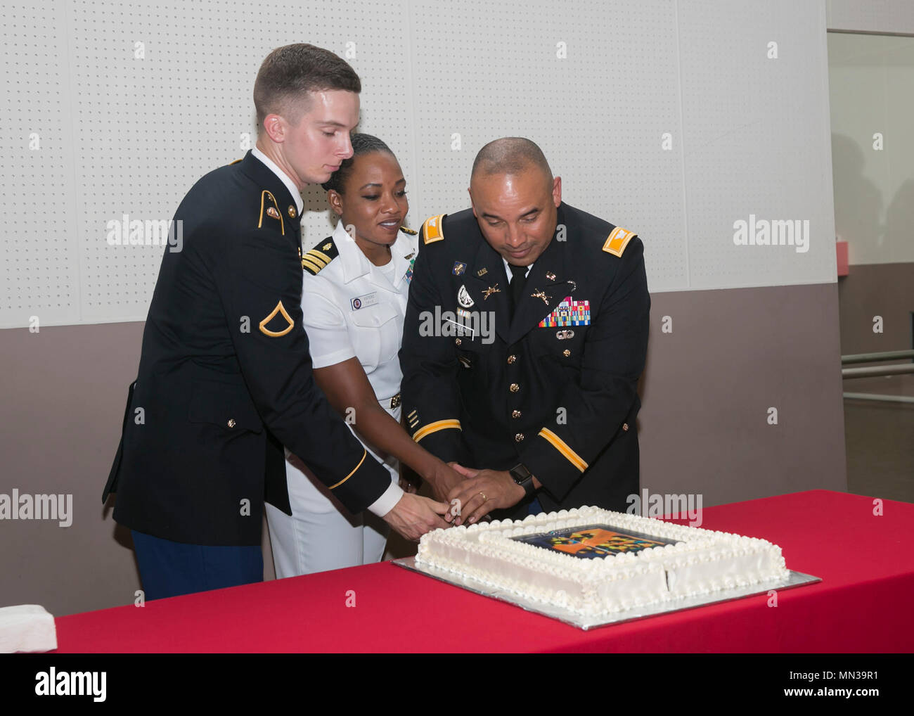 From left to right: Pfc. Joshua Ball, Navy Cmdr. Sonya Waters, and Col ...