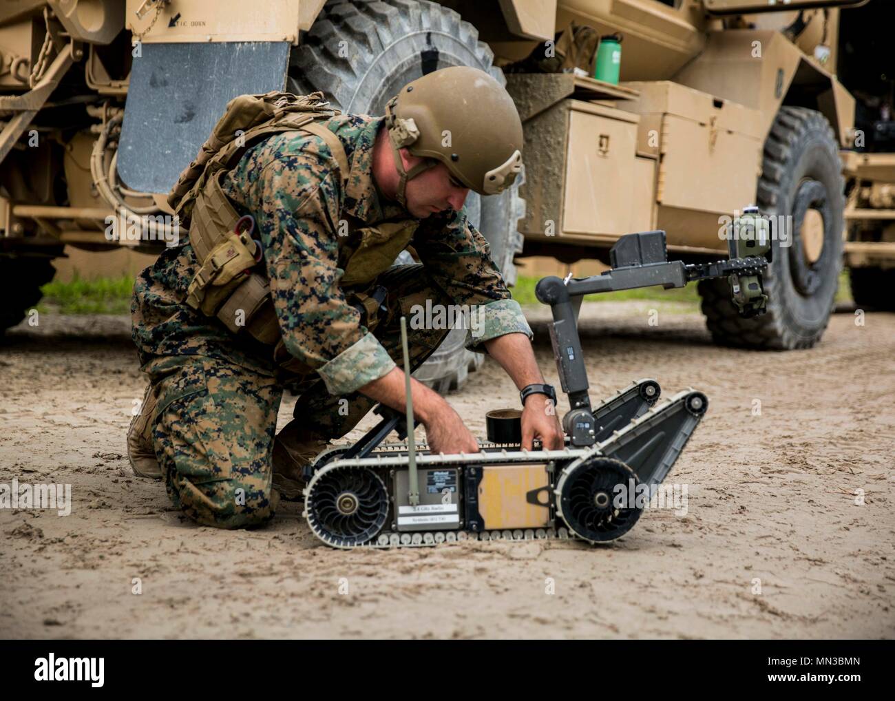 U.S. Marine Corps Sgt. Brett Hughes, an explosive ordnance disposal (EOD) technician with 2nd ...