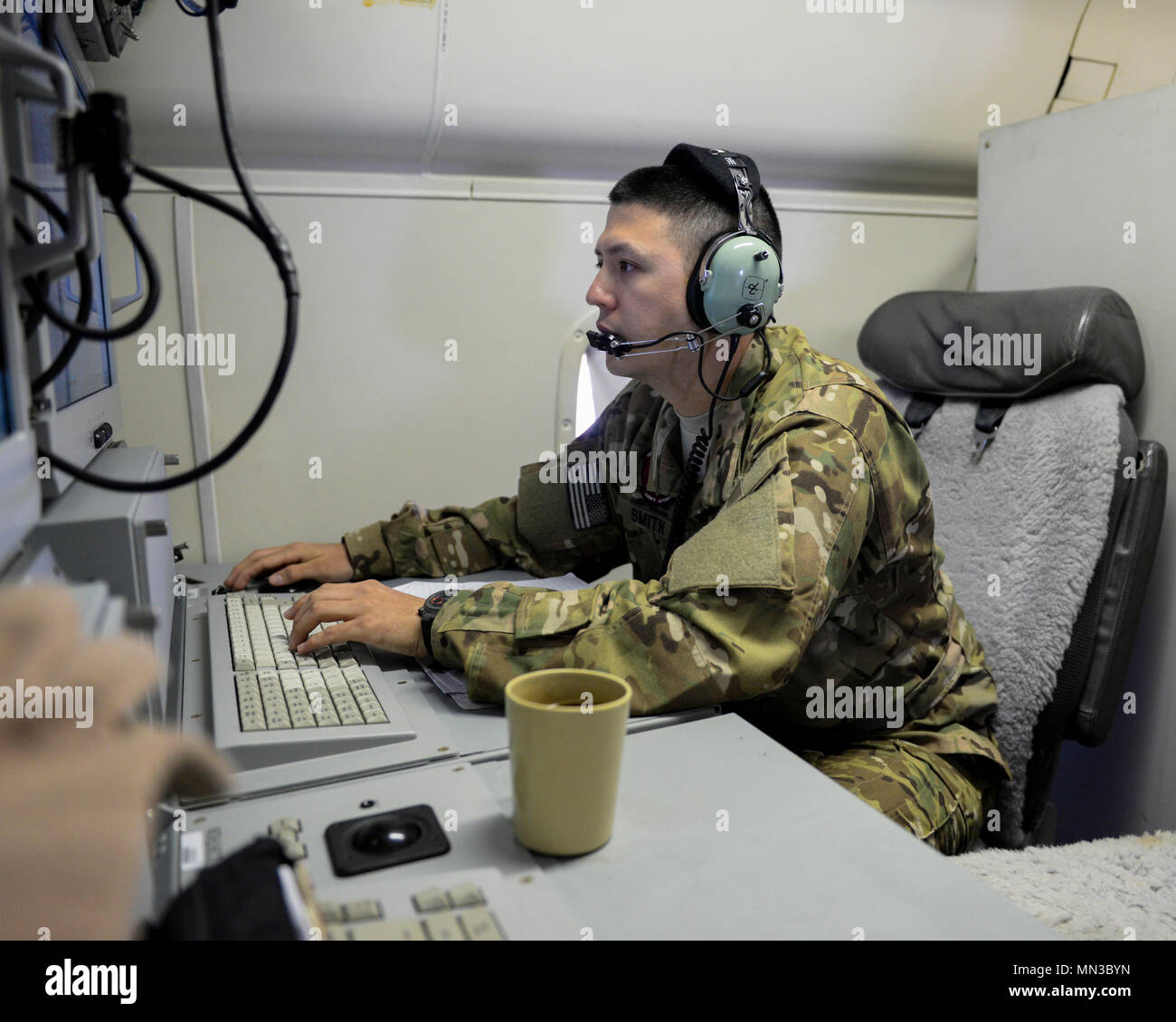 U.S. Army Sgt. Joshua Smith, airborne target surveillance supervisor ...