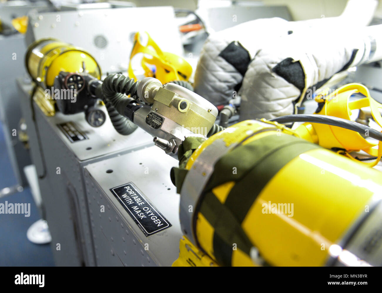Portable oxygen tanks used in the event of an emergency are seen on ...