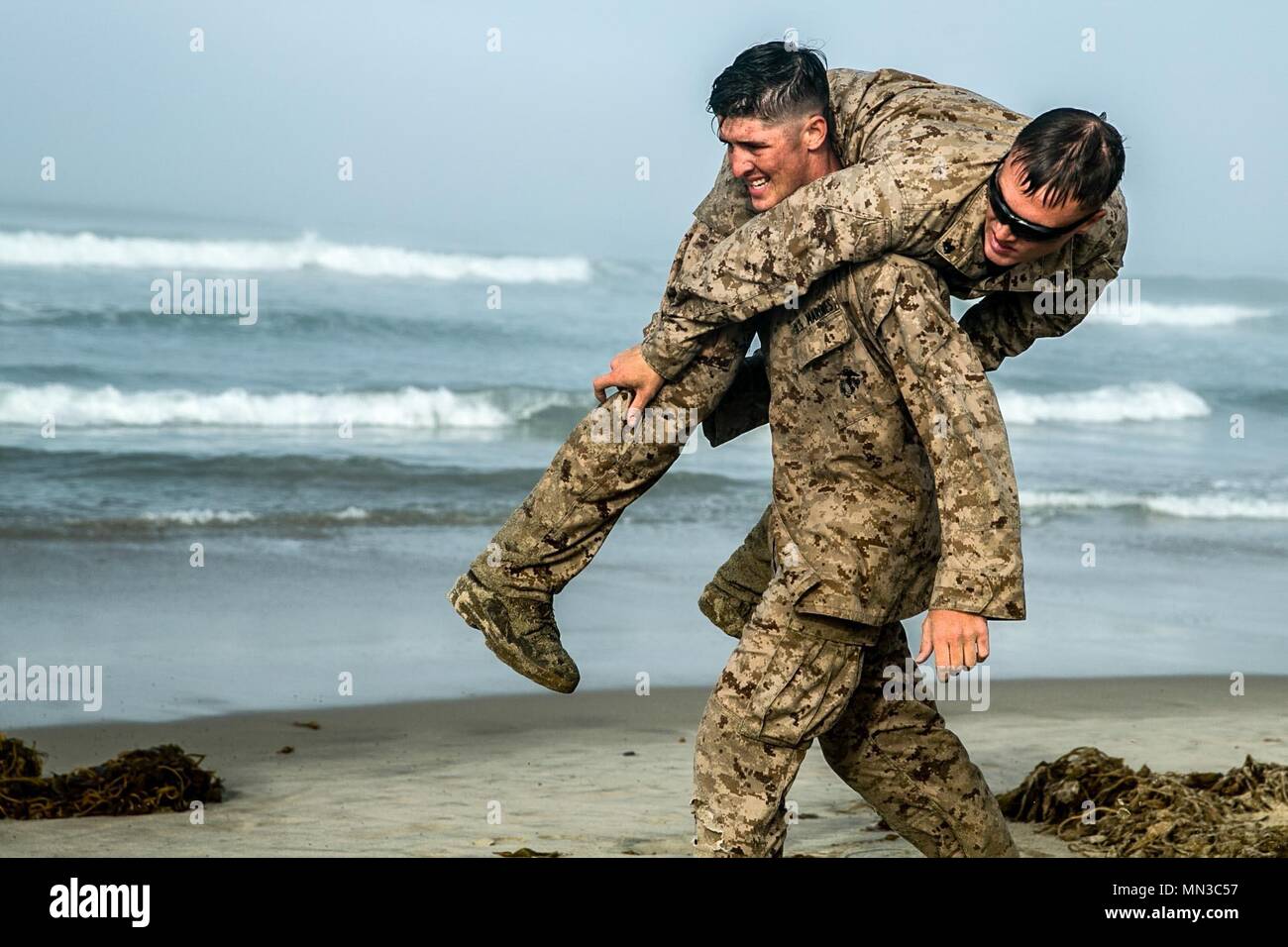 Firemans Carry High Resolution Stock Photography and Images - Alamy