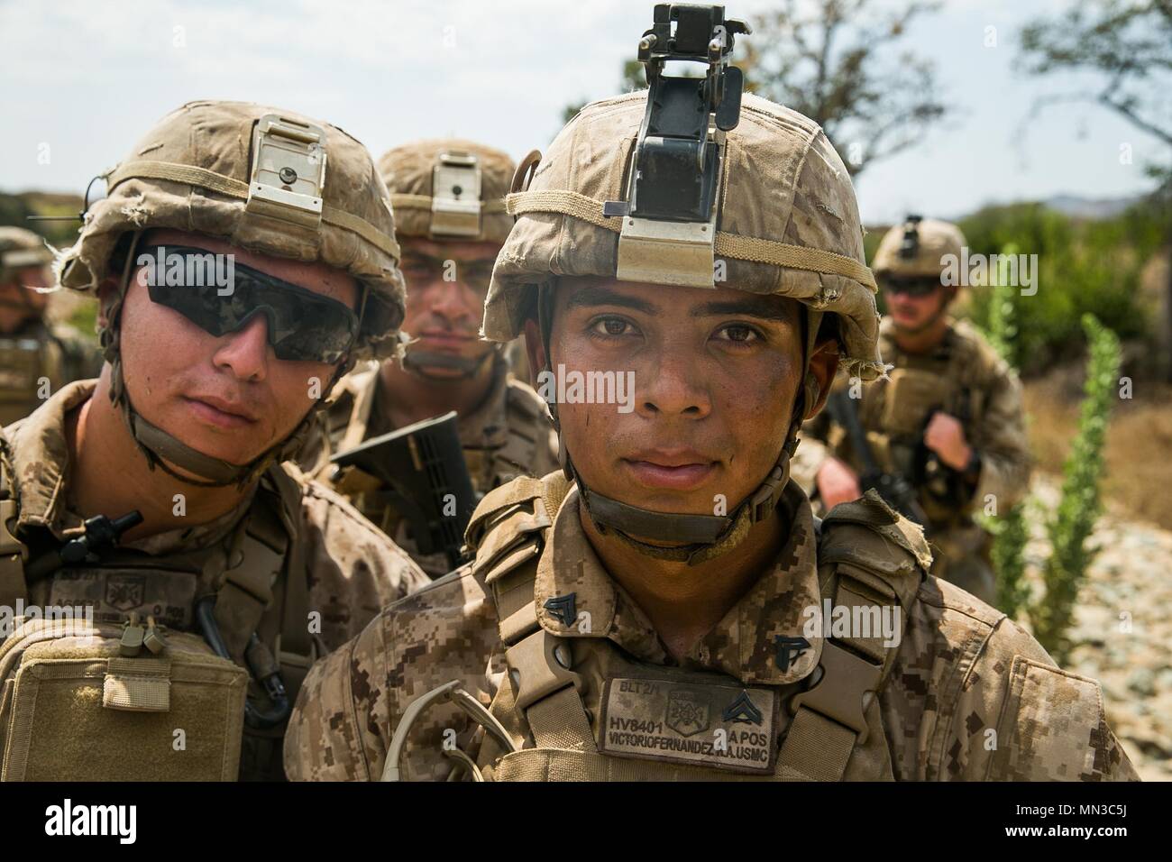 U.S. Marines with 1st Battalion, 1st Marine Regiment, pose for a photo ...