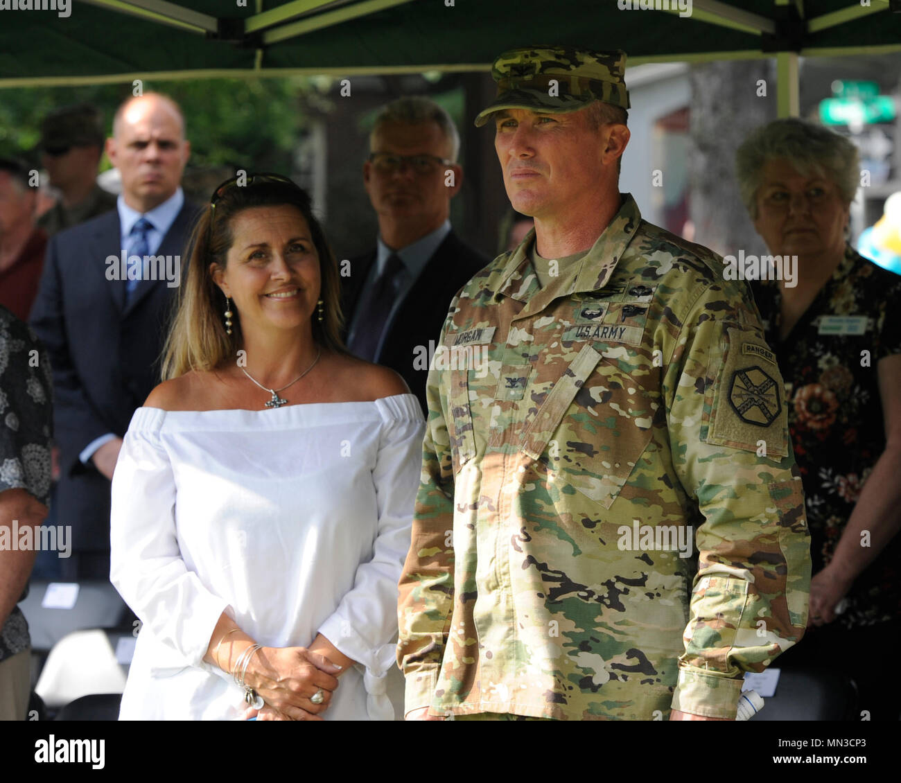 Standing at attention was COL Daniel S. Morgan next to his wife at the ...