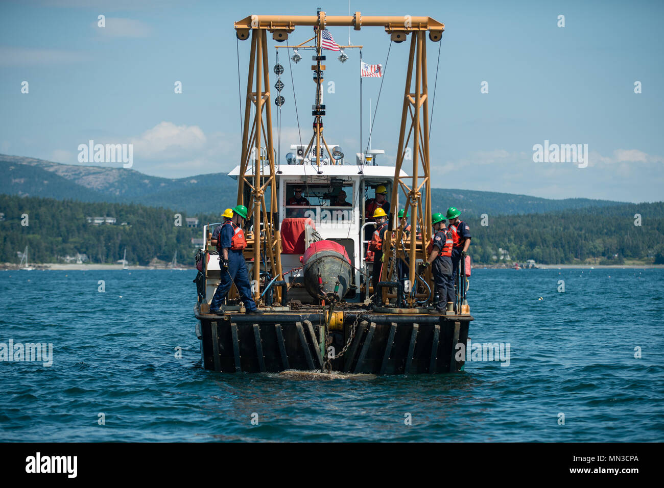 A 49-foot Buoy Utility Stern Loading (BUSL) boat crew from Aids to ...