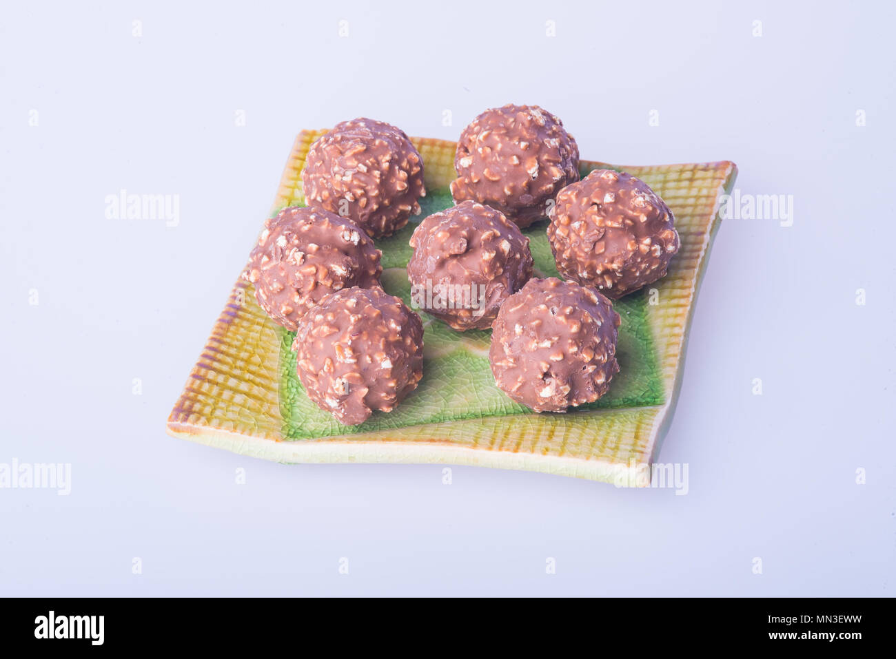 chocolate ball or chocolate in plate on background Stock Photo - Alamy