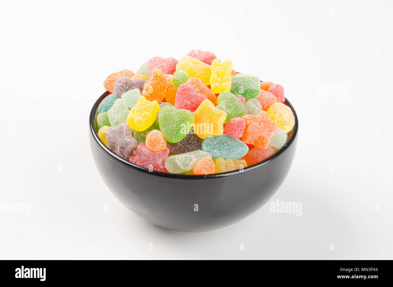 gummy candies in bowl or jelly candies on background Stock Photo - Alamy