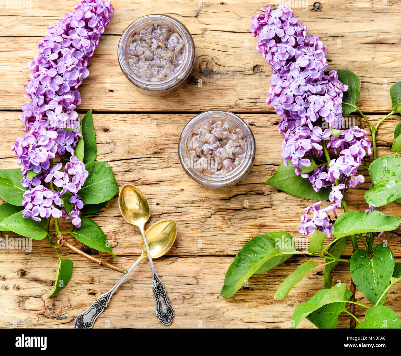 Healing jam from the flowers of spring lilacs.Healing syrup Stock Photo ...