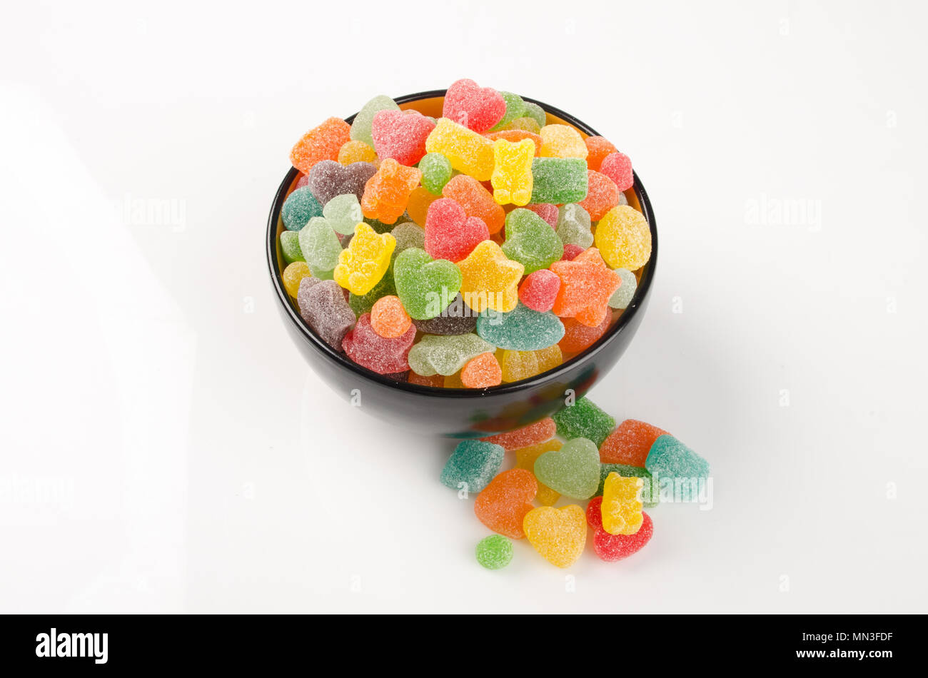 gummy candies in bowl or jelly candies on background Stock Photo - Alamy