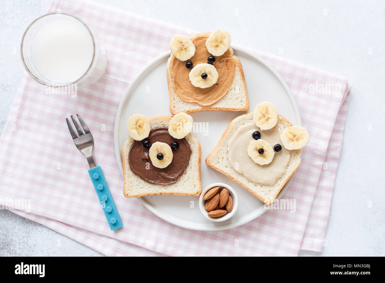 School lunch or breakfast for kids. Peanut butter banana toast with ...