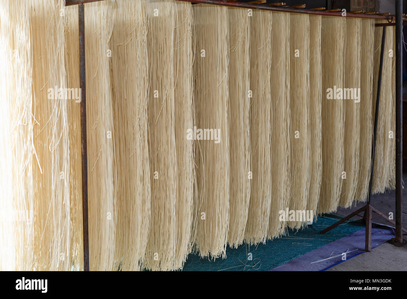 Dried noodles in the sun Stock Photo - Alamy