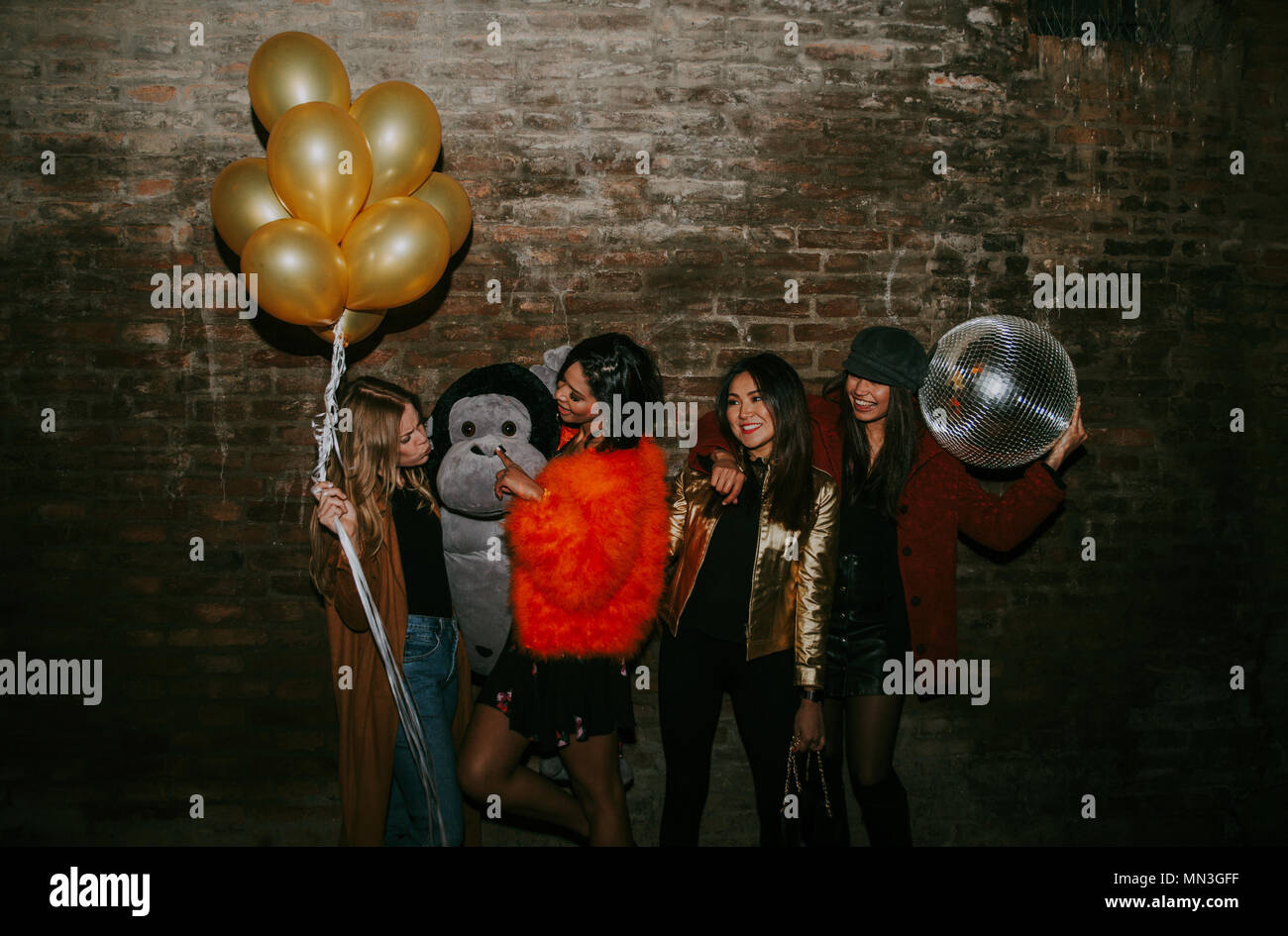 Group of girls celebrating and having fun the club. Concept about women ...