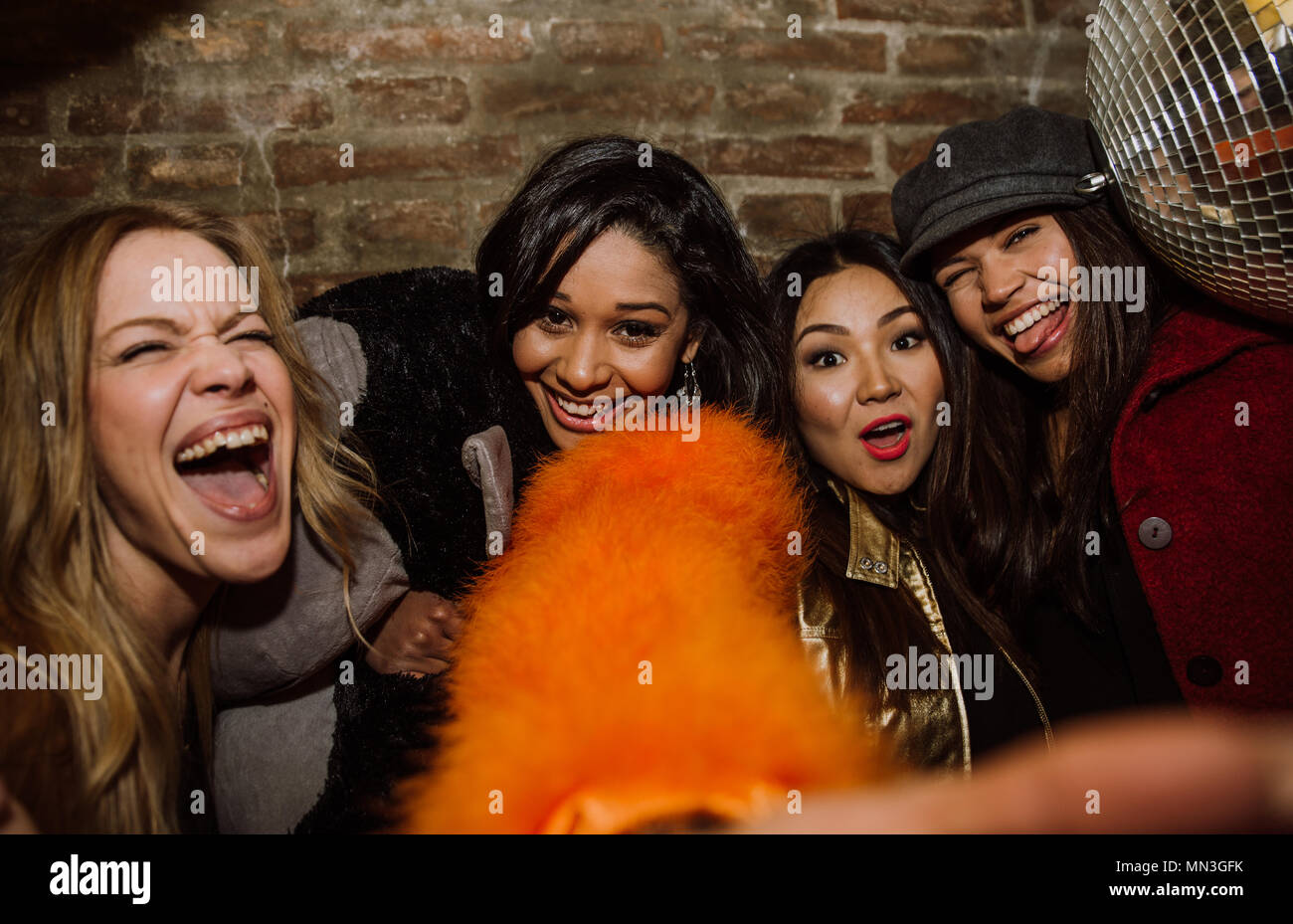 Group of girls celebrating and having fun the club. Concept about women ...