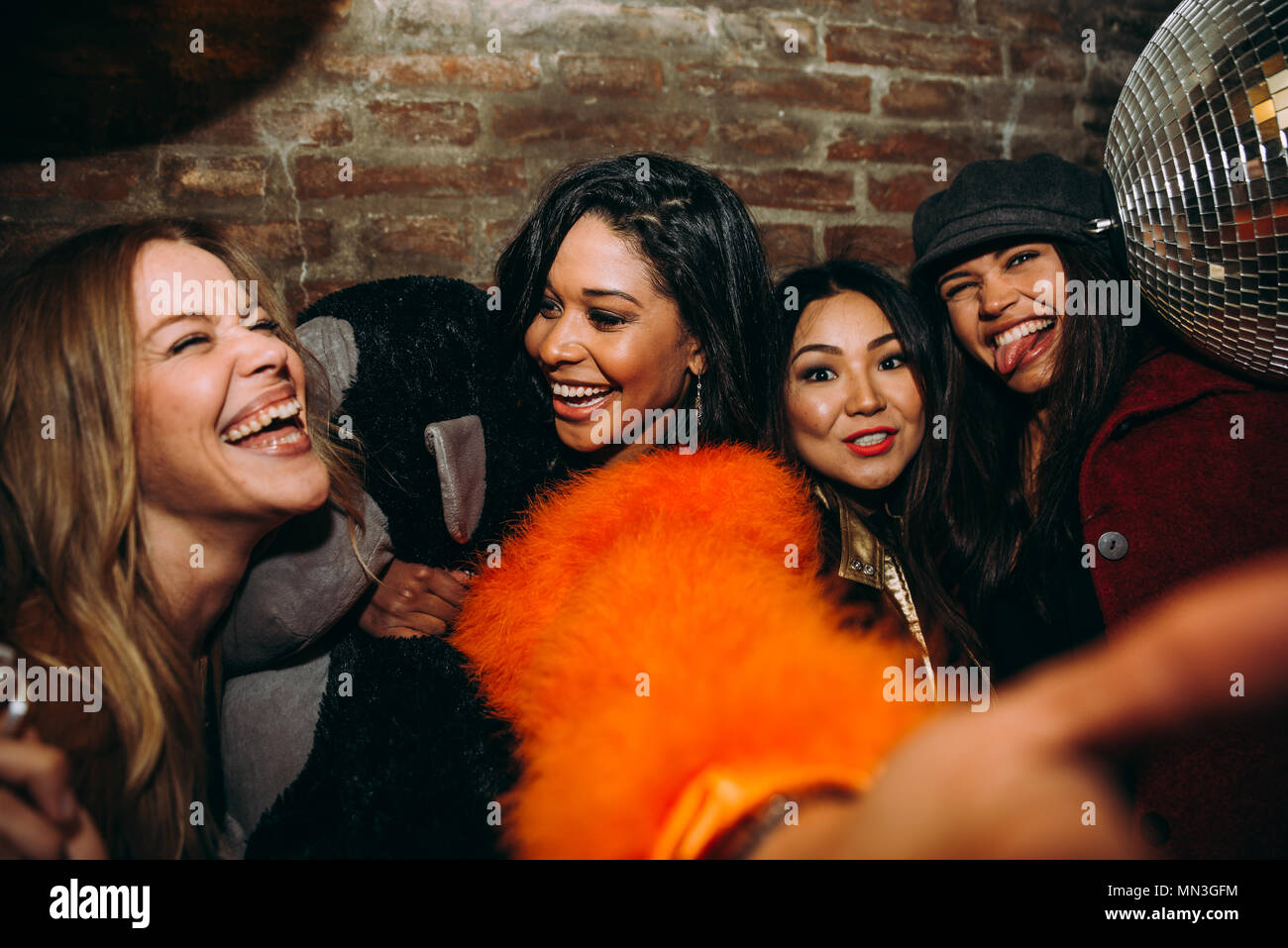 Group of girls celebrating and having fun the club. Concept about women ...