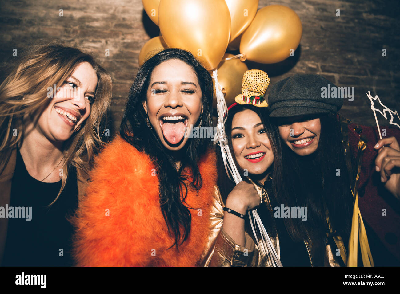 Group of girls celebrating and having fun the club. Concept about women ...