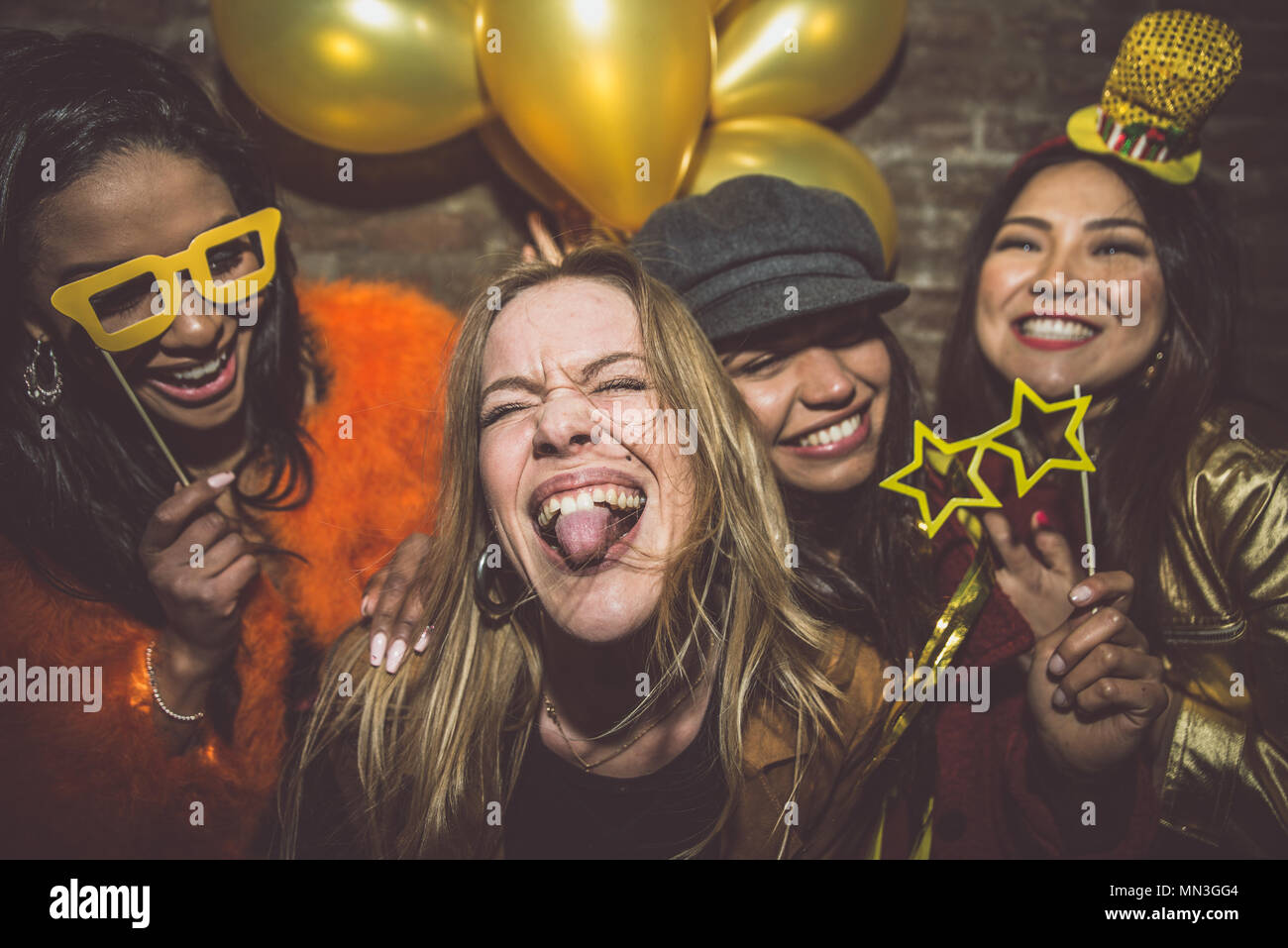 Group of girls celebrating and having fun the club. Concept about women ...
