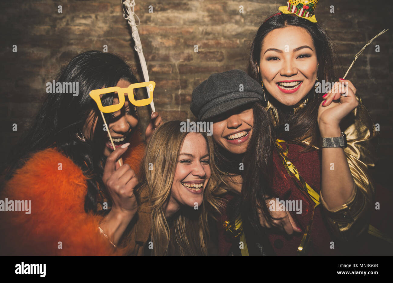 Group of girls celebrating and having fun the club. Concept about women ...