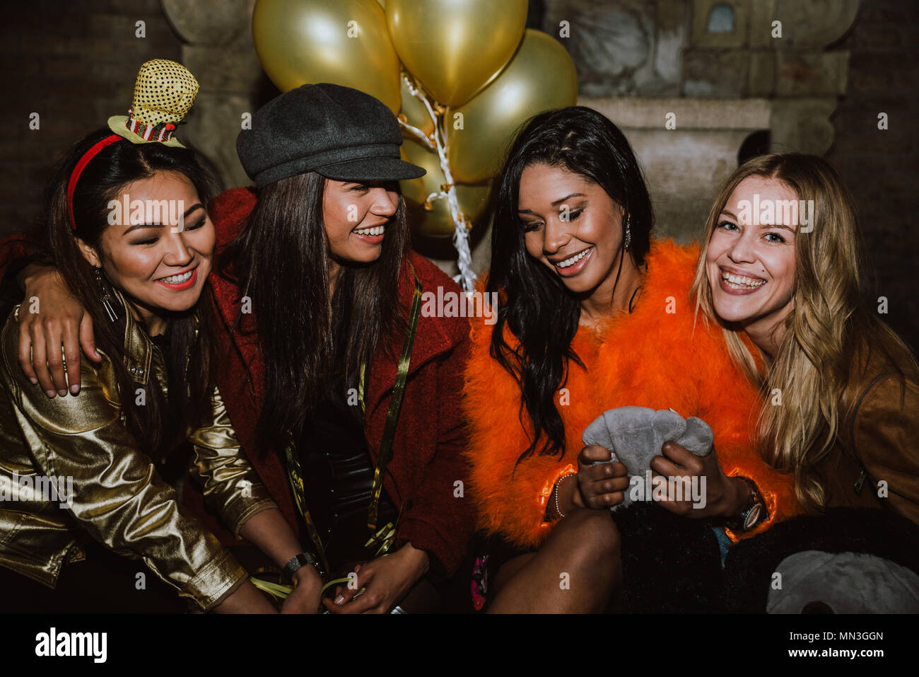 Group of girls celebrating and having fun the club. Concept about women ...