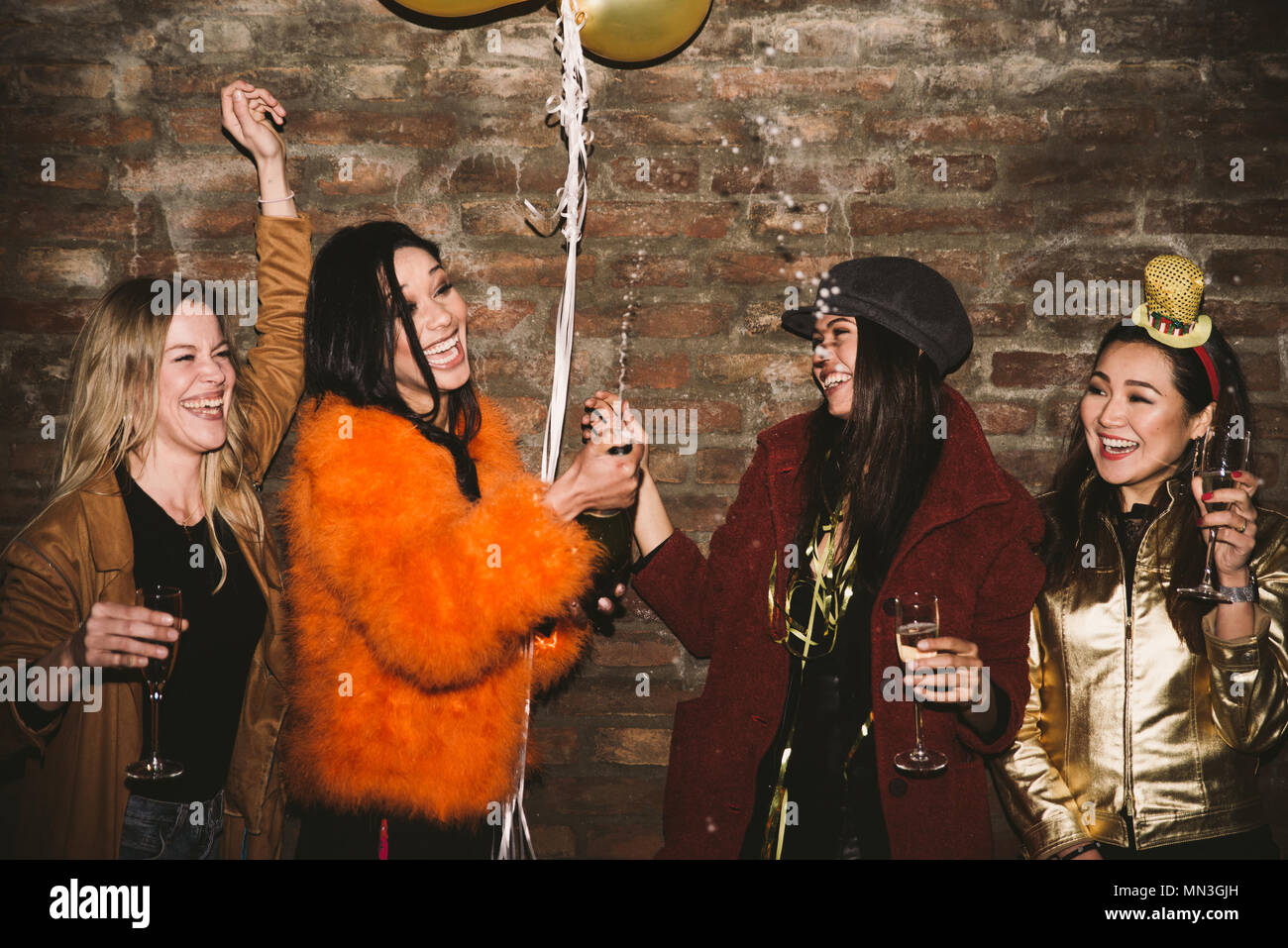 Group of girls celebrating and having fun the club. Concept about women ...