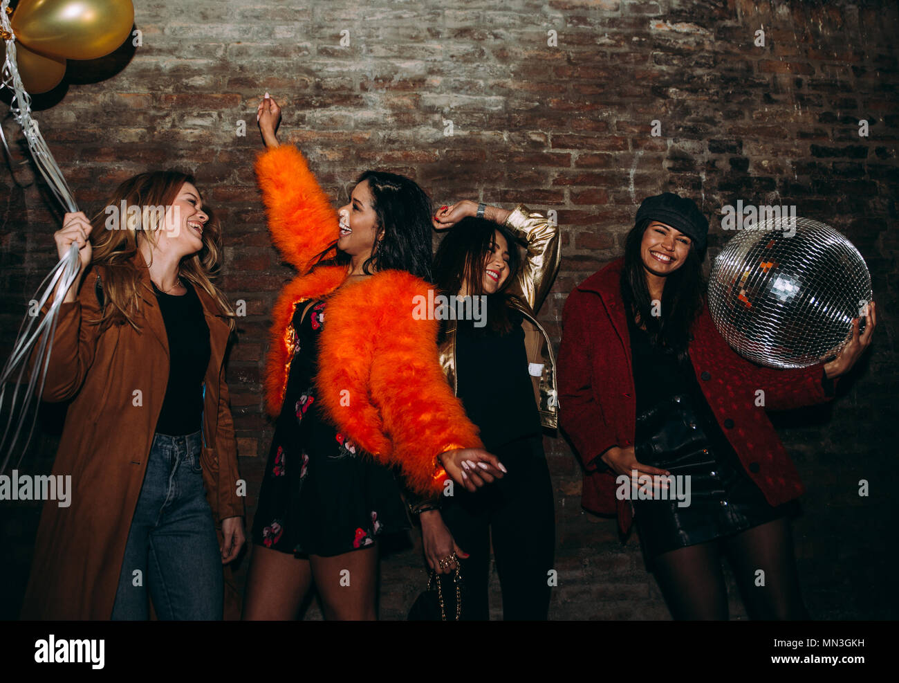 Group of girls celebrating and having fun the club. Concept about women ...