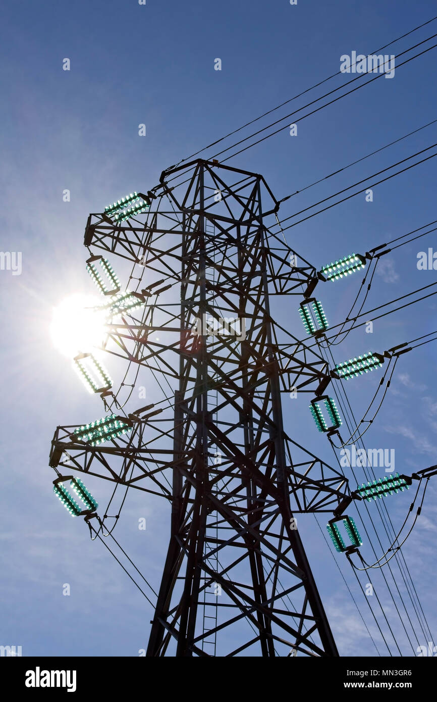 electric power lines and the sun Stock Photo - Alamy